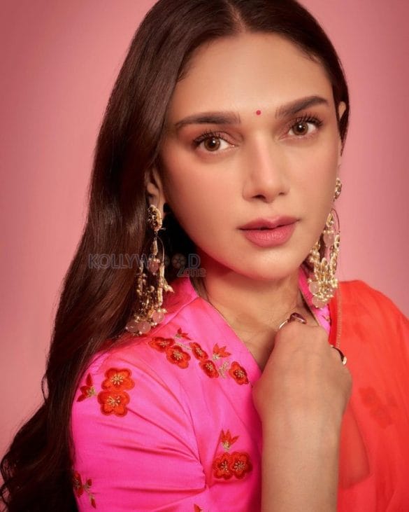 Beautiful Actress Aditi Rao Hydari In A Vibrant Orange Saree With A ...