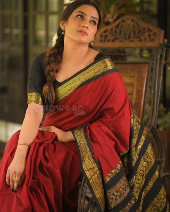 Beautiful Aditi Ravi In A Maroon Silk Saree With Contrast Black Peacock ...