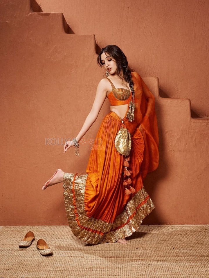 Dude Actress Neha Shetty In An Orange Lehenga With A Bold Bustier Top ...
