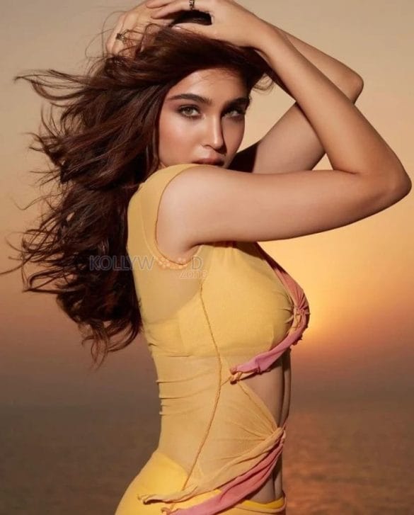 Steaming Sexy Sharvari Wagh In A Yellow And Blush Pink Bikini Photos 02 (291252) | Kollywood Zone