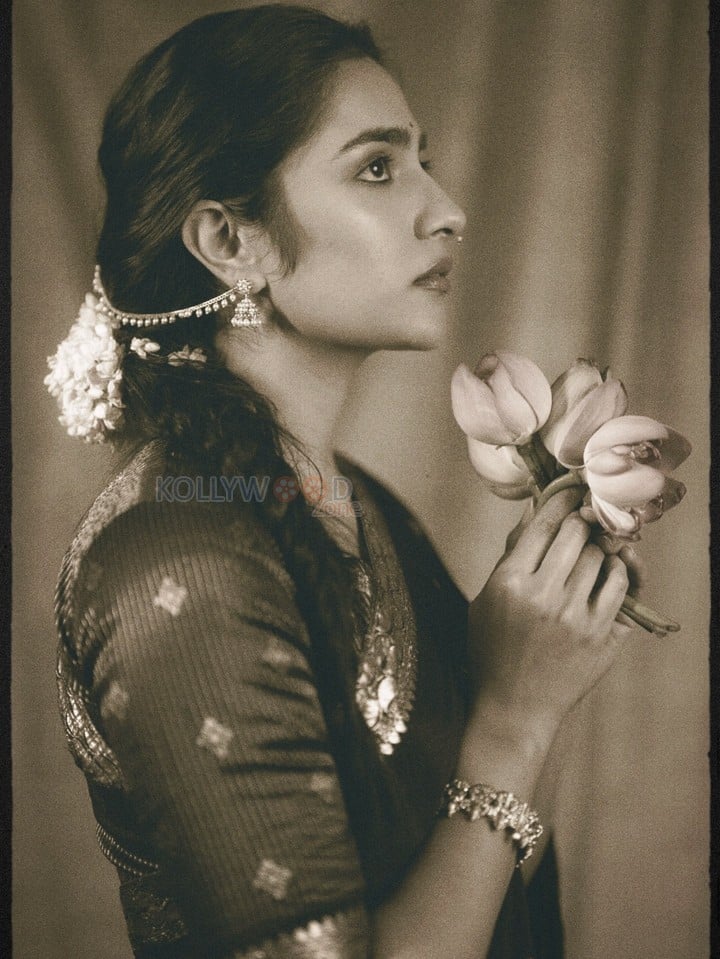 Charming Actress Rukmini Vasanth In A Retro Purple And Orange Outfit With A Pink Lotus Photos 04 ...