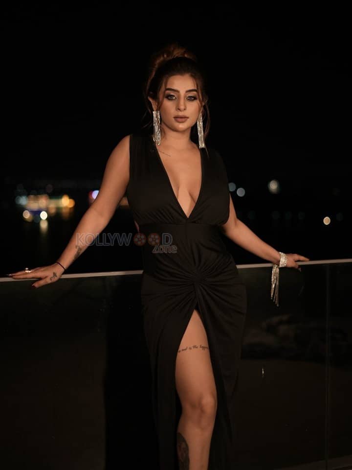 Desirable Ankita Dave In A Black Deep V Neck Dress With High Thigh Slit ...