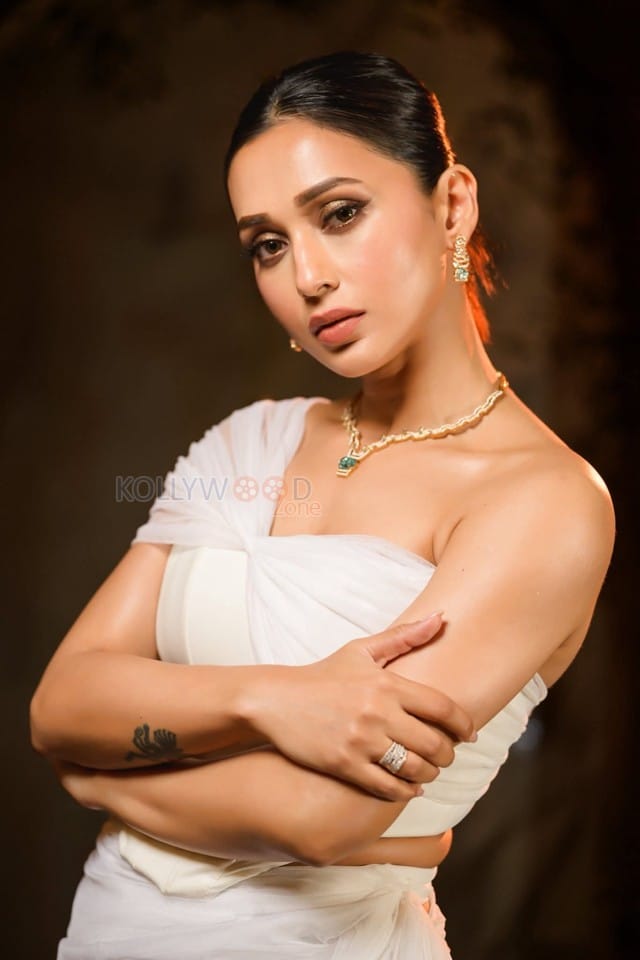 Elegant Actress Mimi Chakraborty In A White Off Shoulder Draped Saree ...